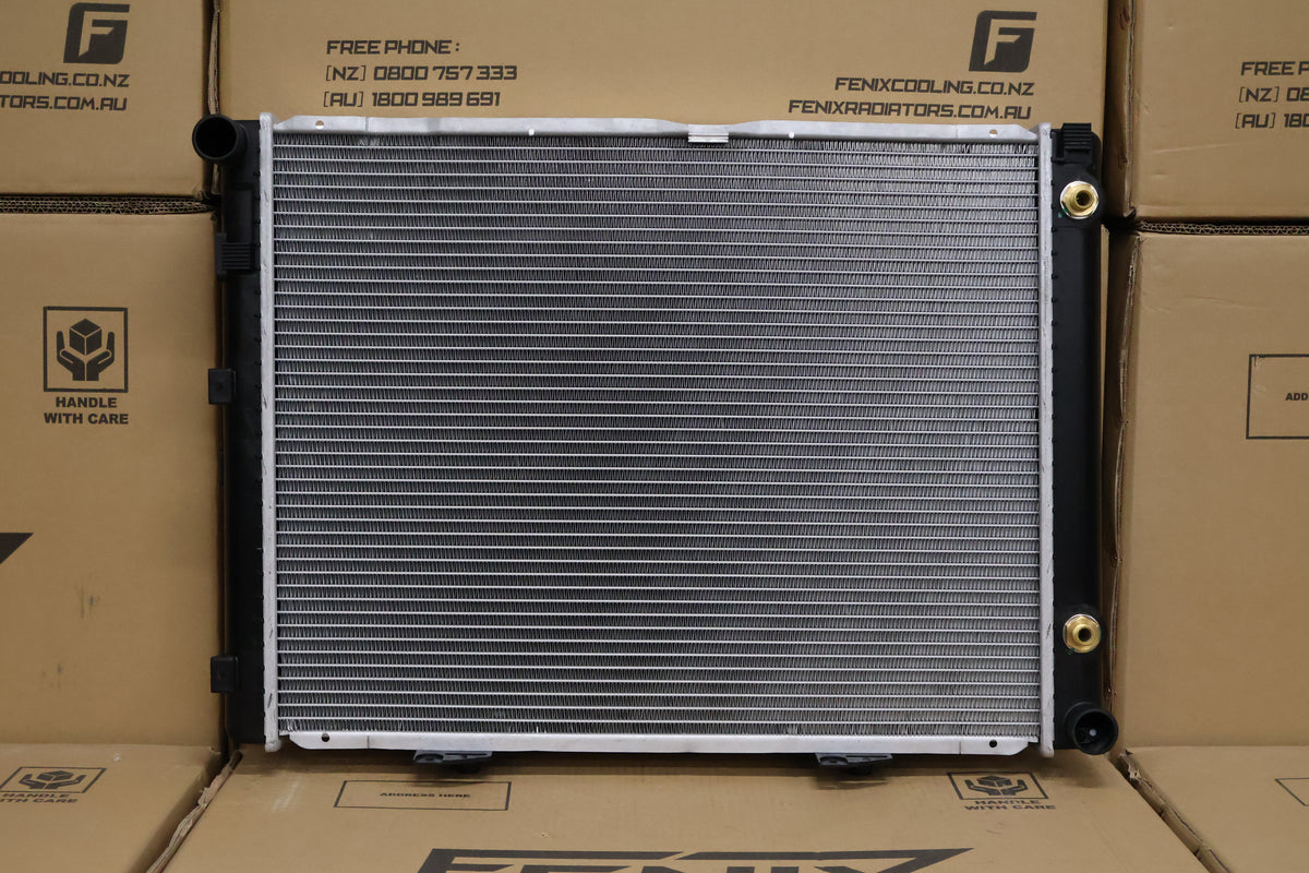 Mercedes Benz 190E W201 Radiator (OCT/1983 - DEC/1993). — fenixautoparts